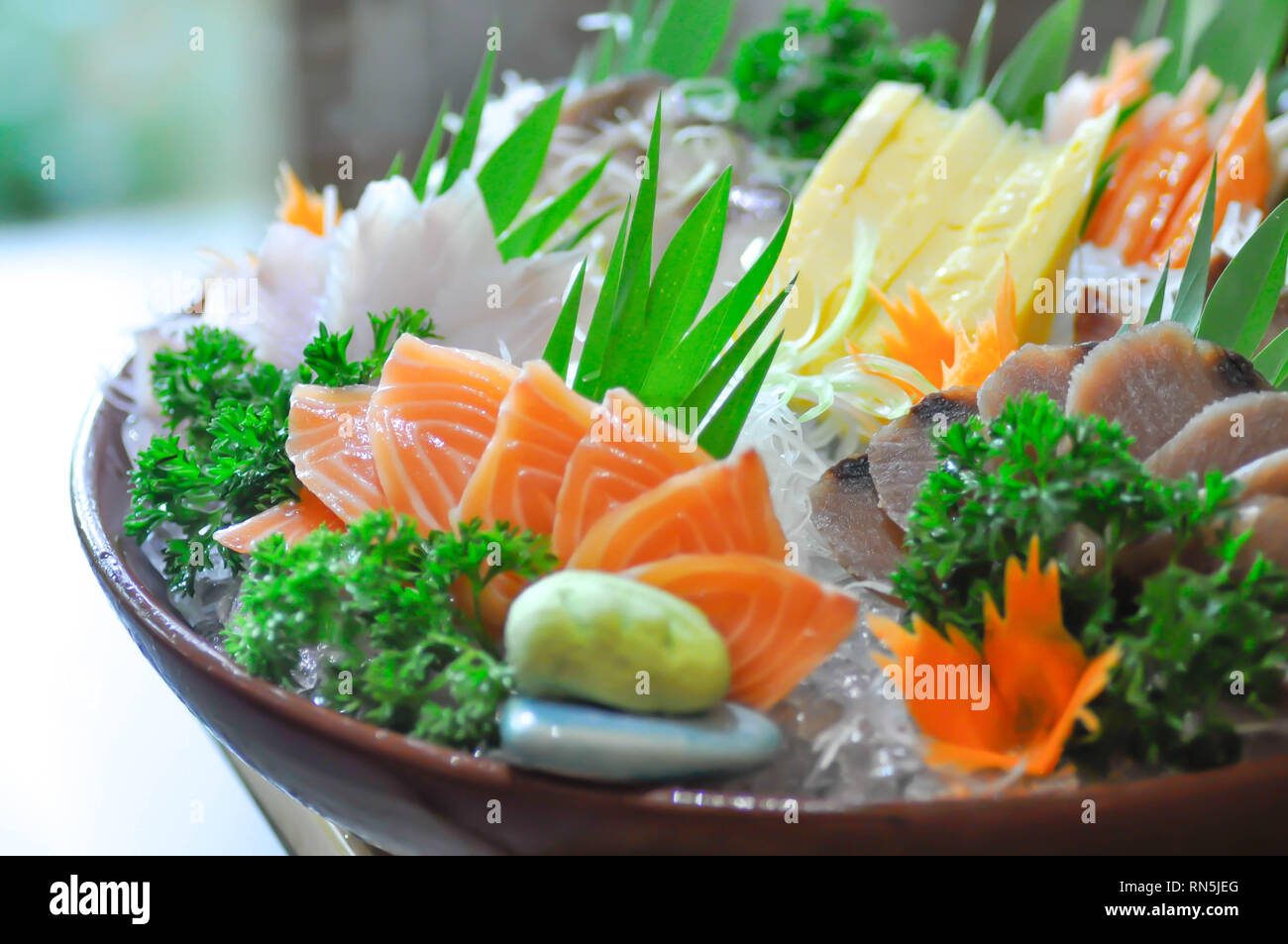 raw fish or raw salmon and wasabi Stock Photo - Alamy