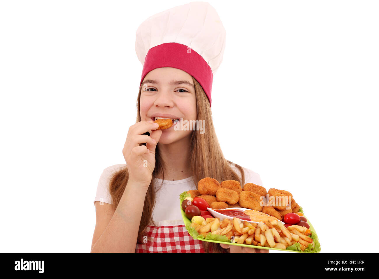 girl cook eats chicken nuggets and french fries Stock Photo - Alamy