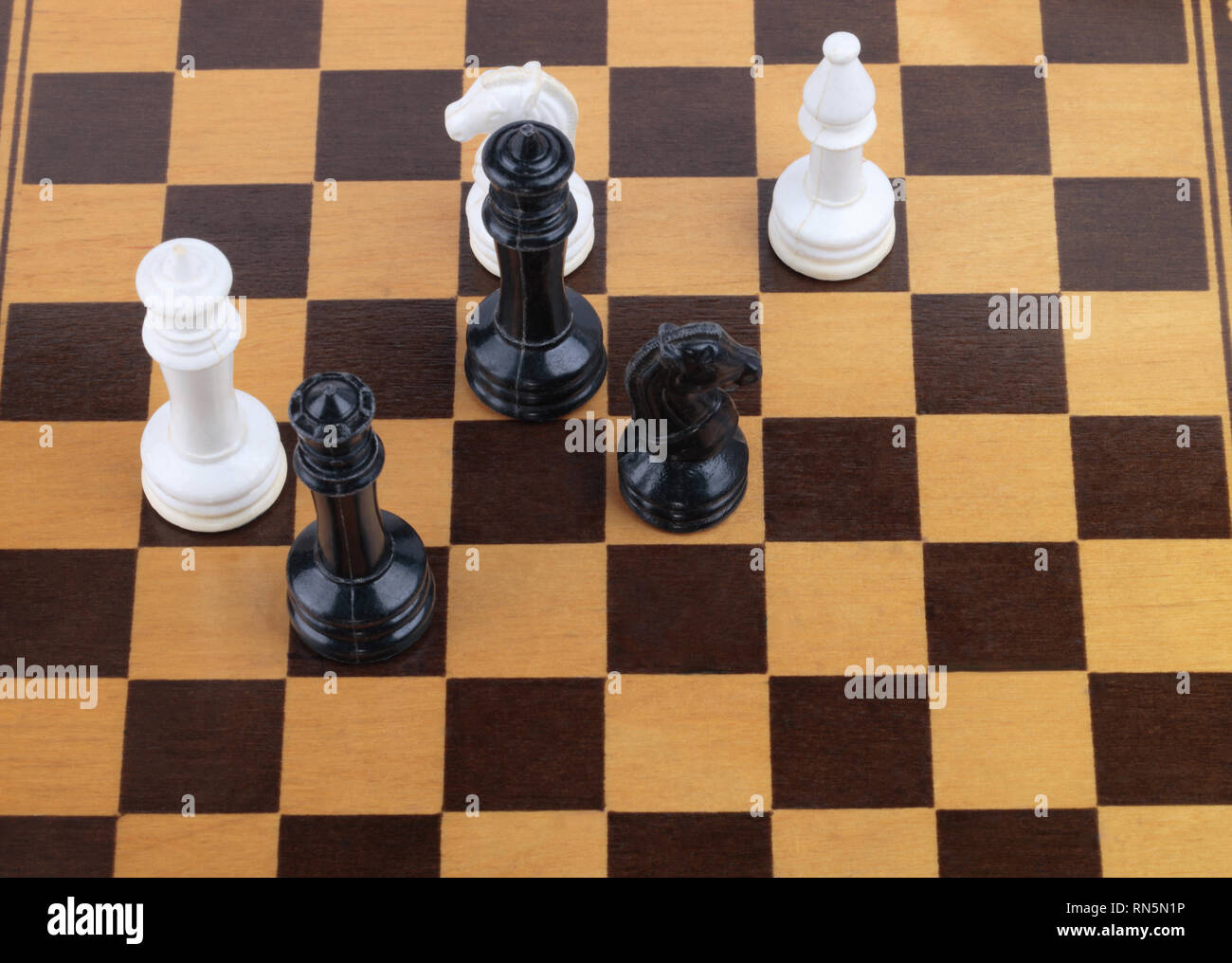 wooden checkerboard with figures Stock Photo - Alamy