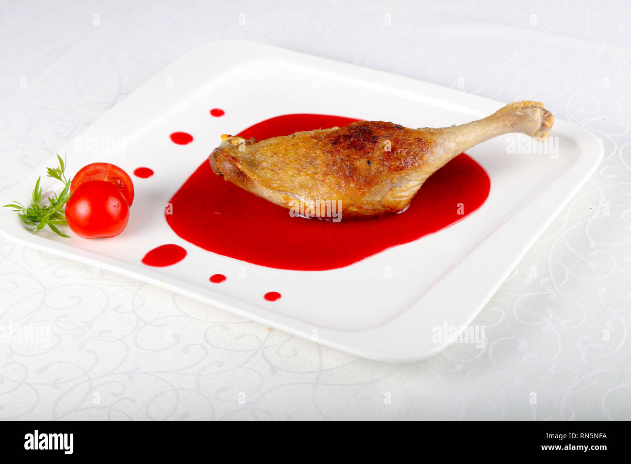 Confit duck legs with orange sauce hi-res stock photography and images ...