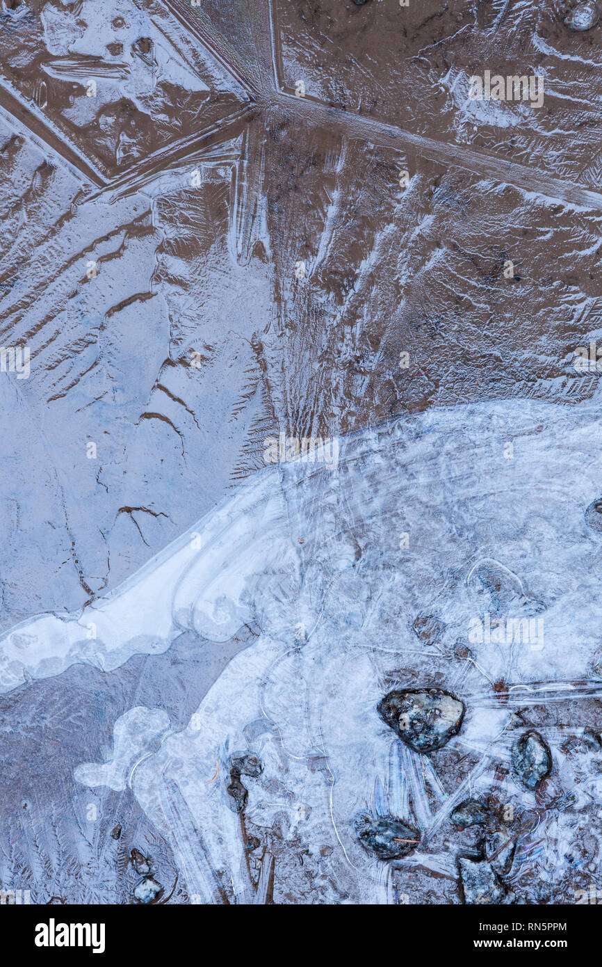 Frozen puddle close-up texture Stock Photo - Alamy