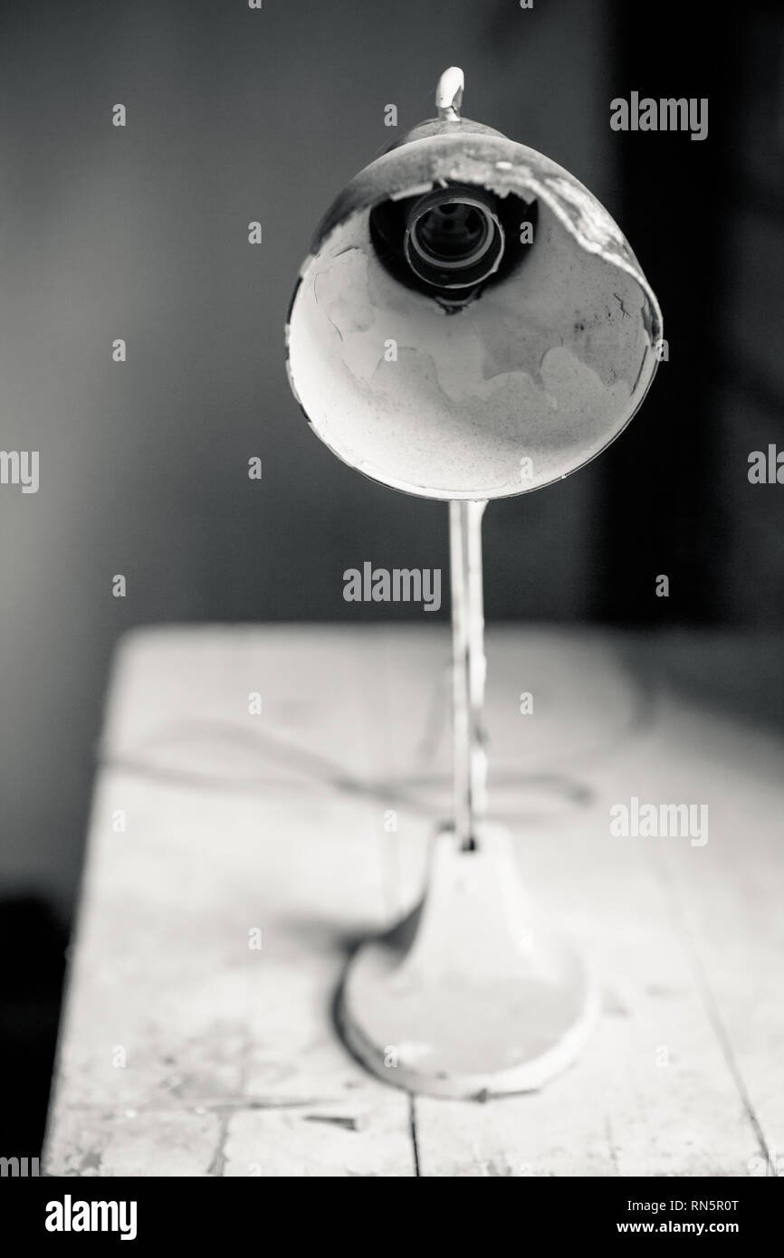 Old broken lamp on table Stock Photo - Alamy
