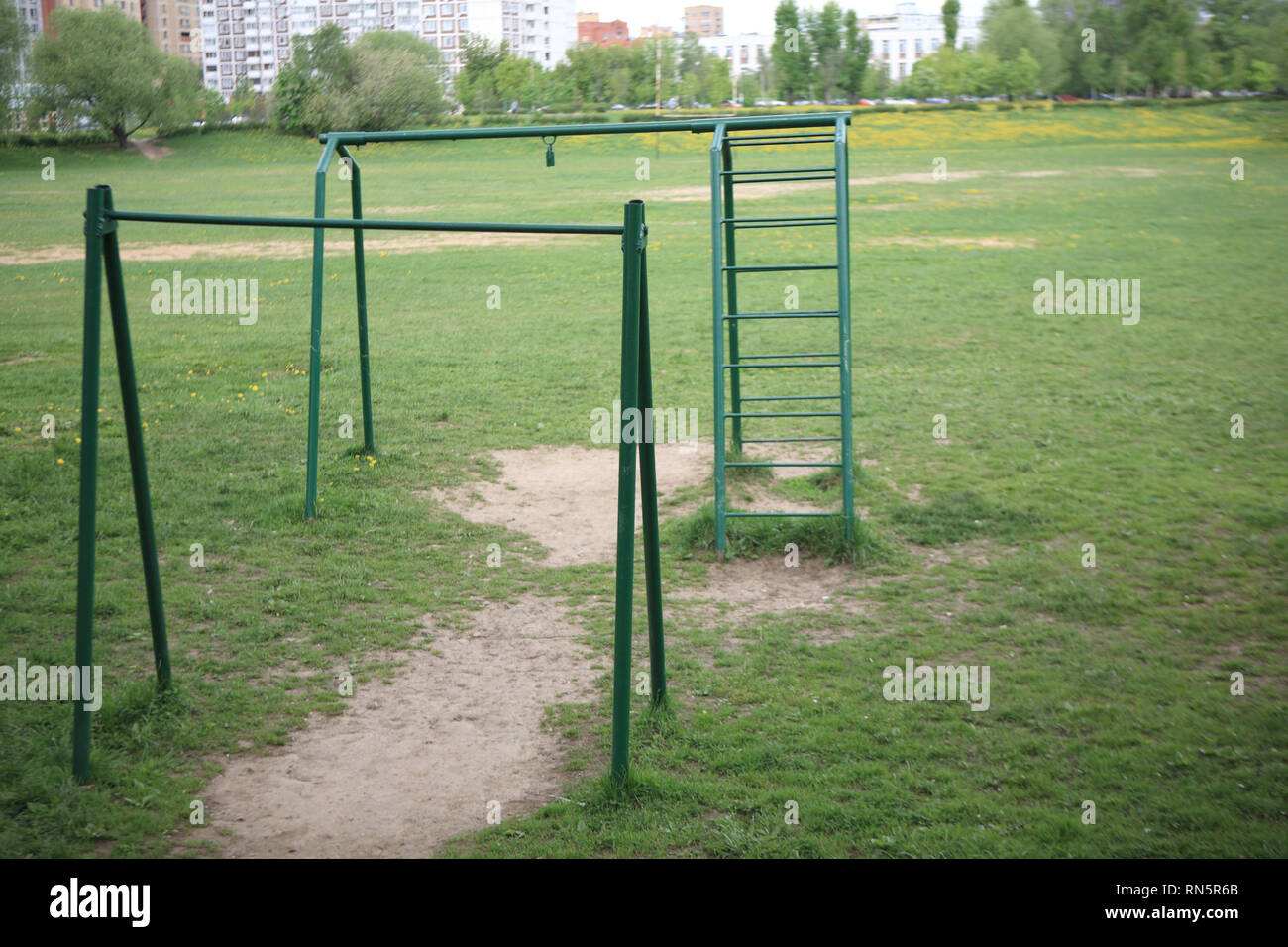 horizontal bar in city park Stock Photo - Alamy