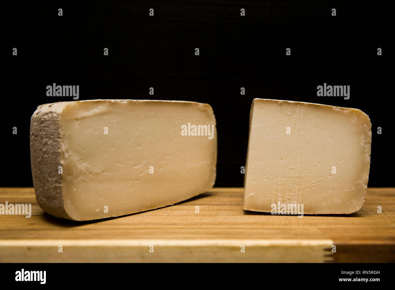 Traditional Auvergne cheese from France on table Stock Photo - Alamy
