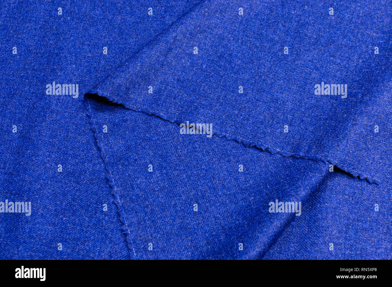 Wool fabric in light blue gray Stock Photo - Alamy