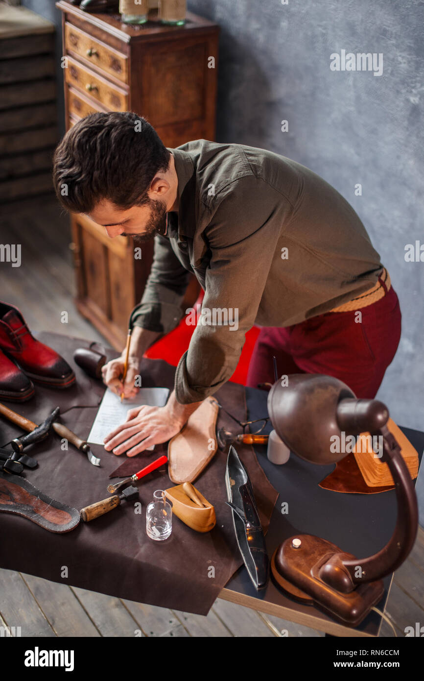designer creating a pattern. close up side view photo Stock Photo - Alamy