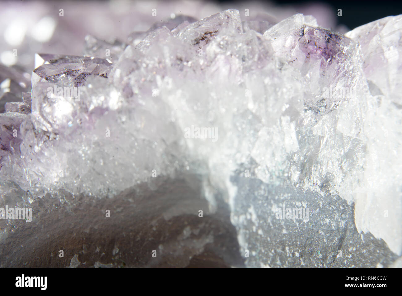 Quartz also called deep quartz photographed in studio in front of black ...