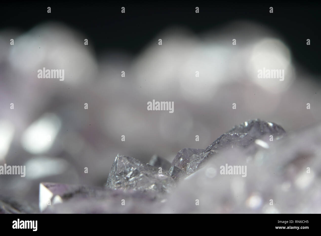 Quartz also called deep quartz photographed in studio in front of black ...