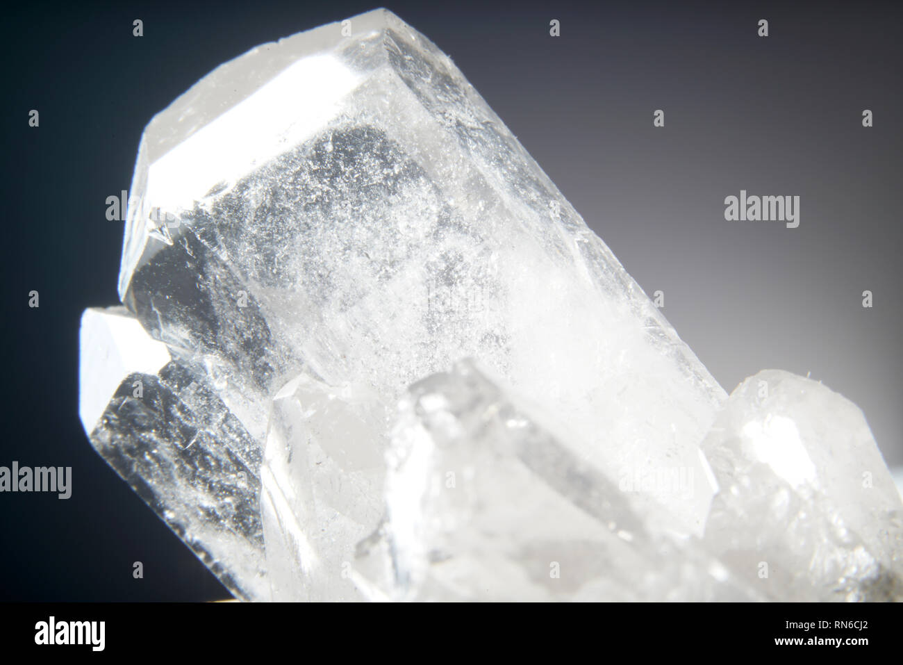 Quartz also called deep quartz photographed in studio in front of black ...