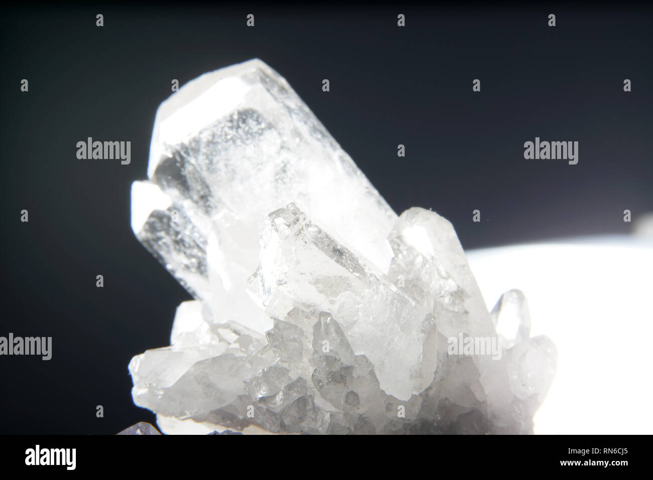 Quartz also called deep quartz photographed in studio in front of black ...