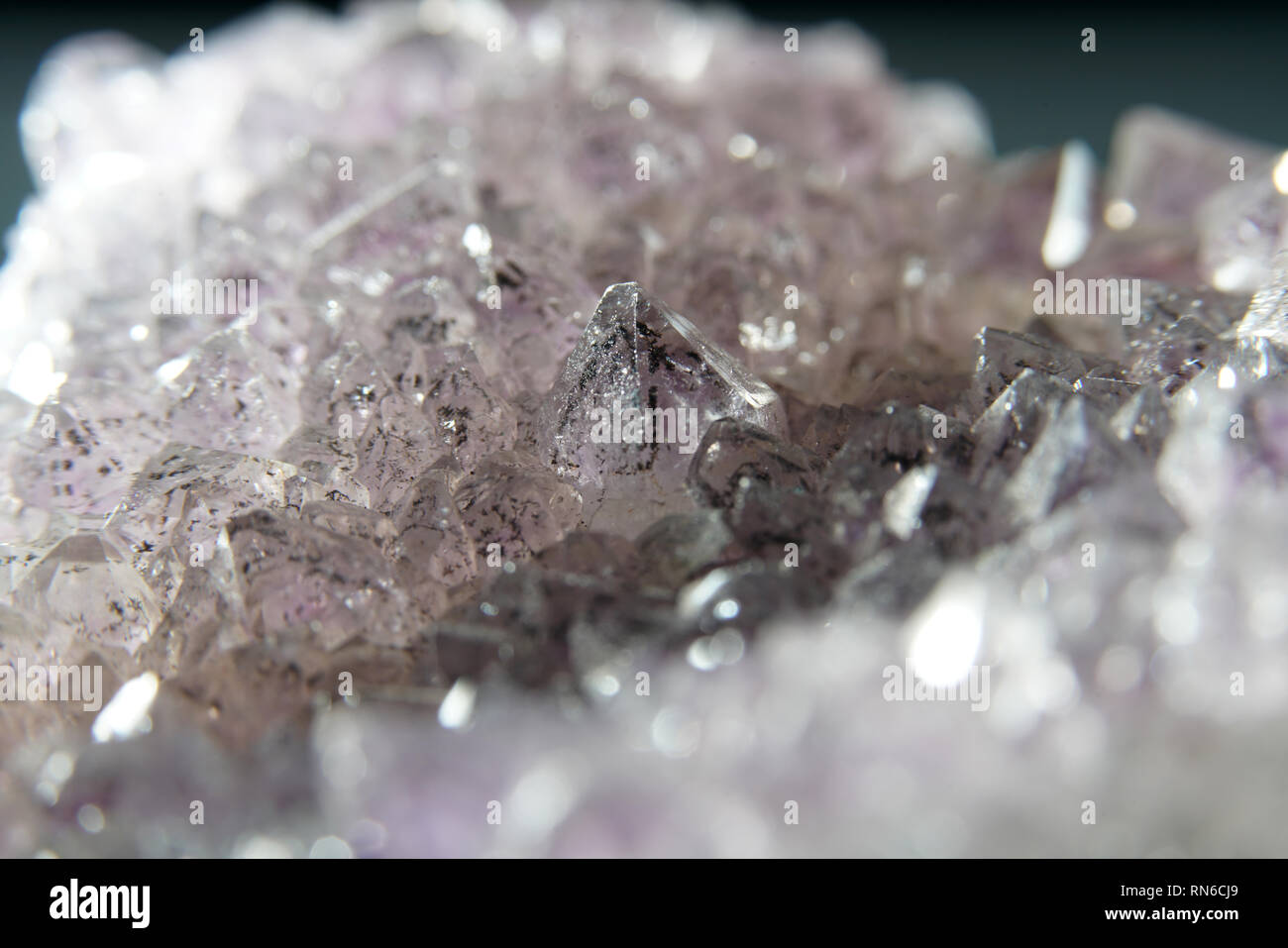 Quartz also called deep quartz photographed in studio in front of black ...