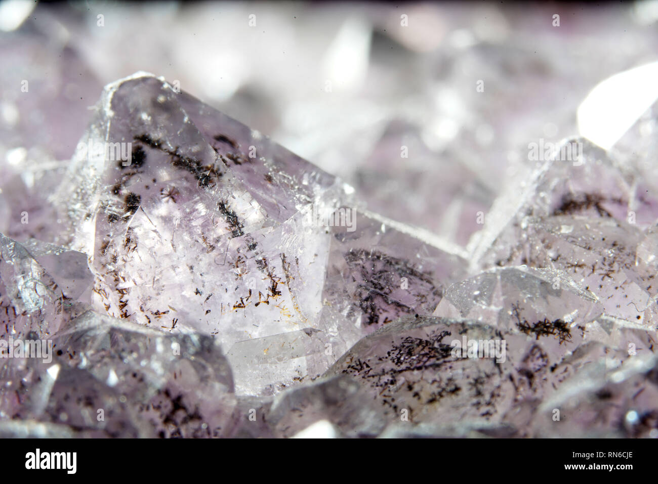 Quartz also called deep quartz photographed in studio in front of black ...