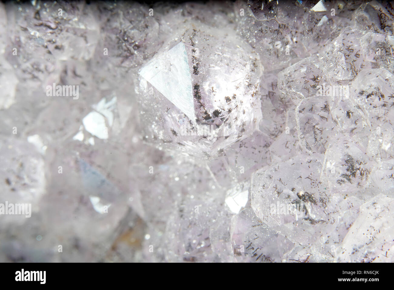 Quartz also called deep quartz photographed in studio in front of black ...