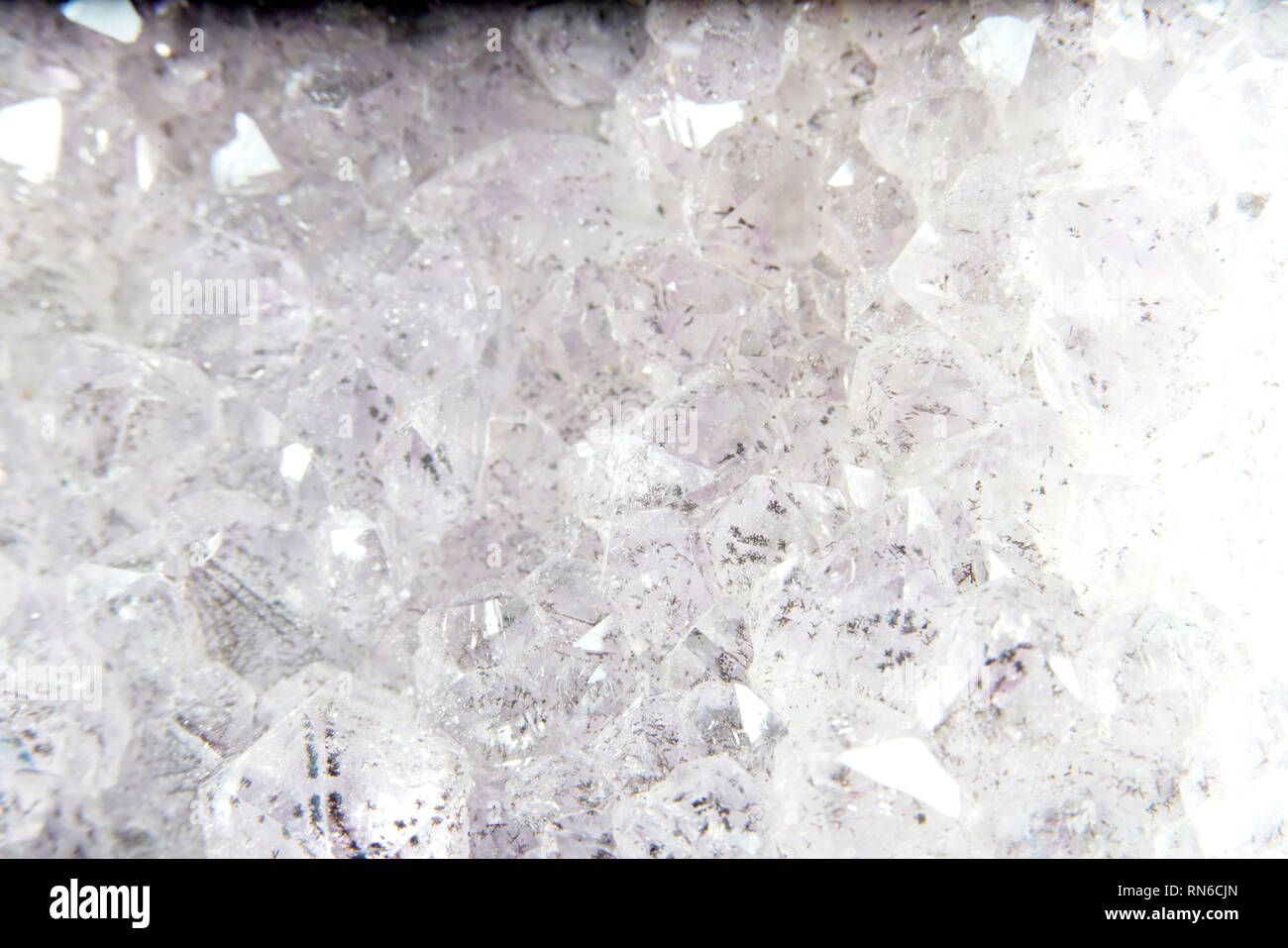 Quartz also called deep quartz photographed in studio in front of black ...