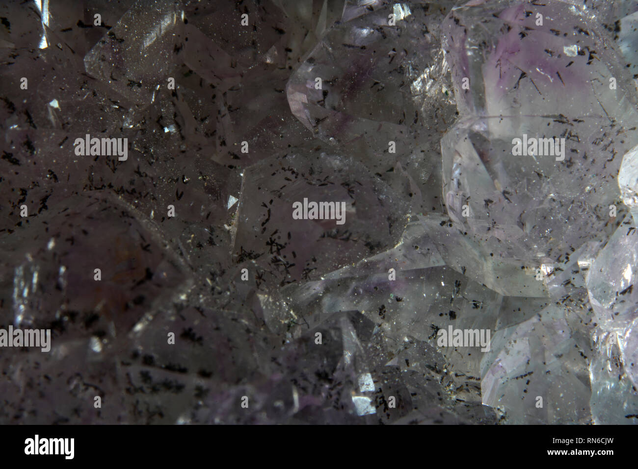 Quartz also called deep quartz photographed in studio in front of black ...