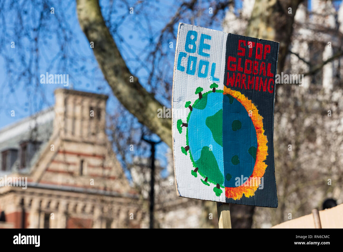 Protestors holding climate change banners at a protest Stock Photo - Alamy