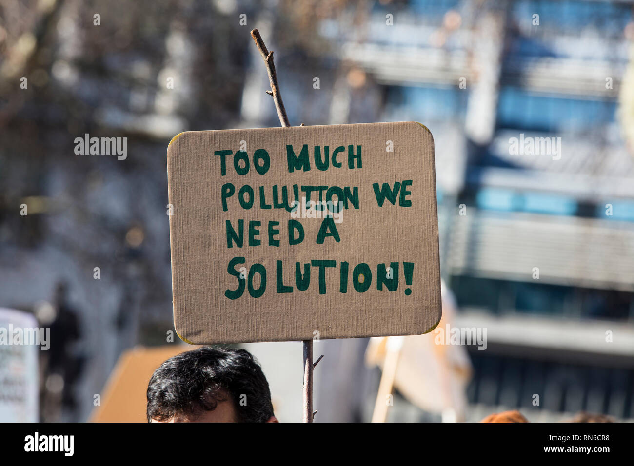 Protestors holding climate change banners at a protest Stock Photo - Alamy