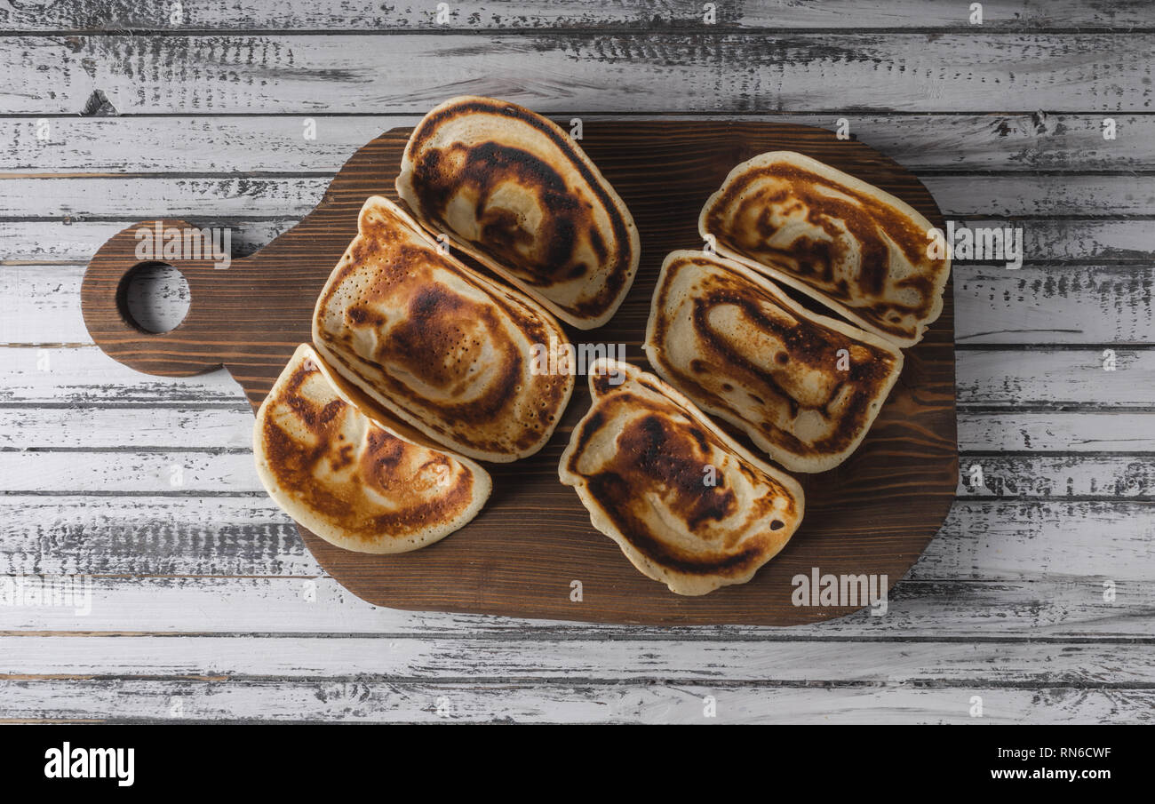 Homemade taco shells, crispy and delish on wood background Stock Photo ...
