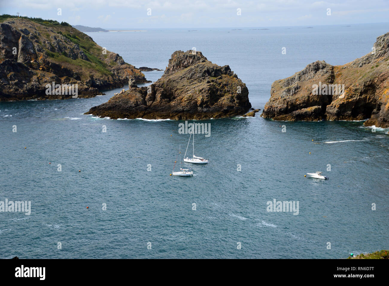 Three Small Boats Moored in La Havre Gosselin Harbour Between the ...