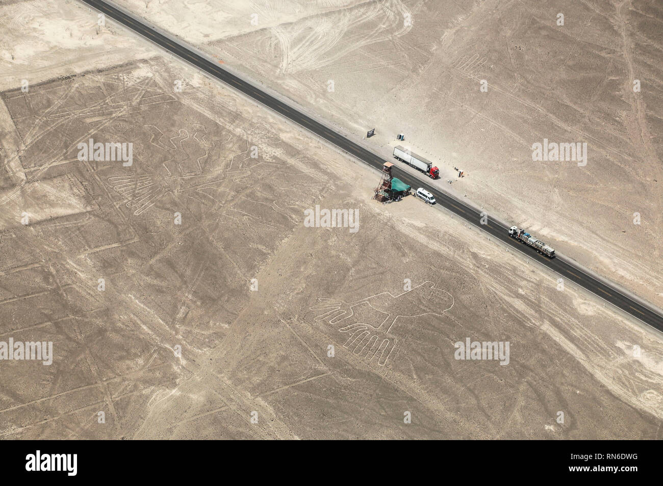 Aerial view Nazca desert and hieroglyphs near Pan American Highway ...