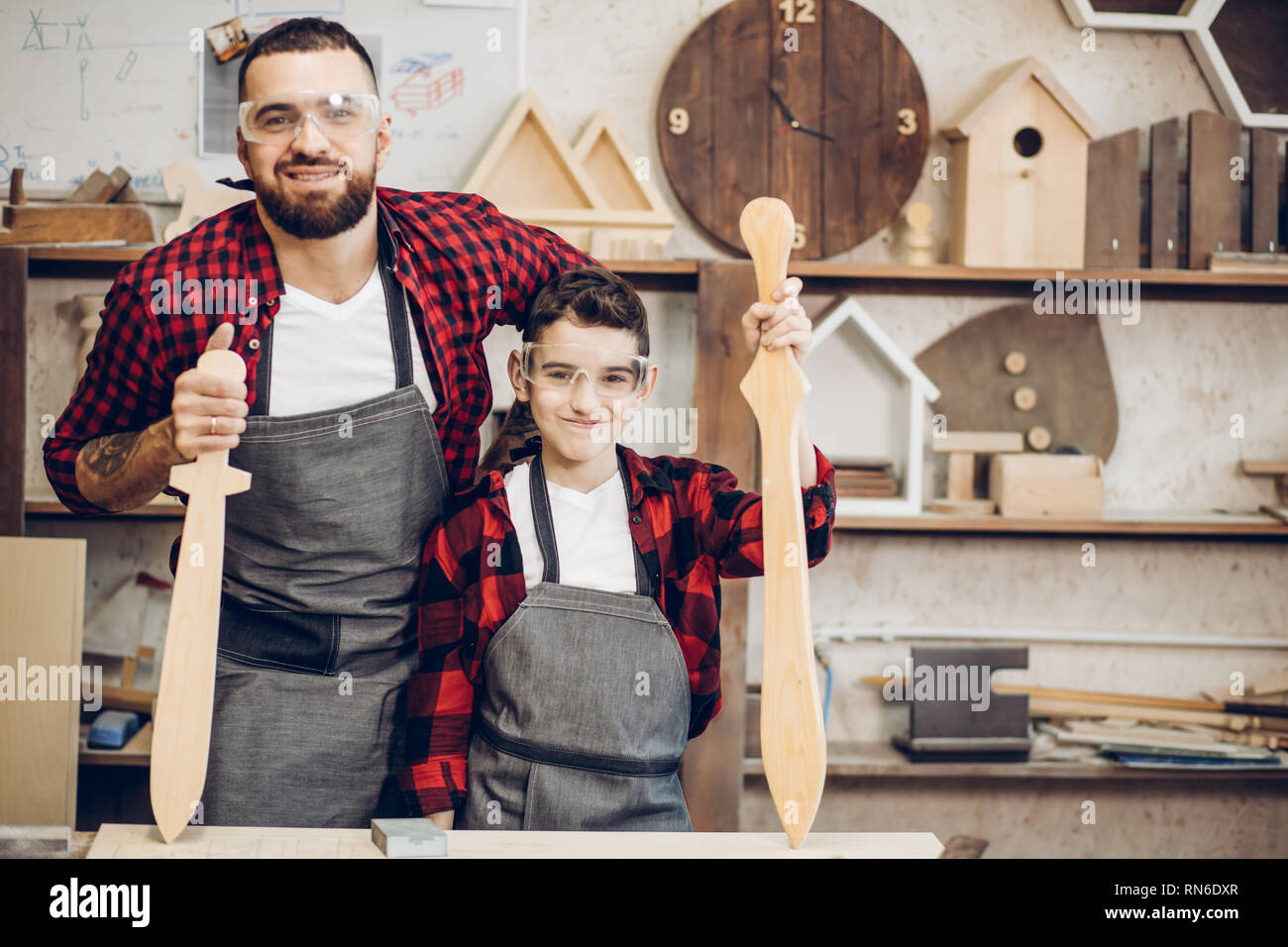 Family relations, fatherhood, hobby, carpentry, woodwork concept ...