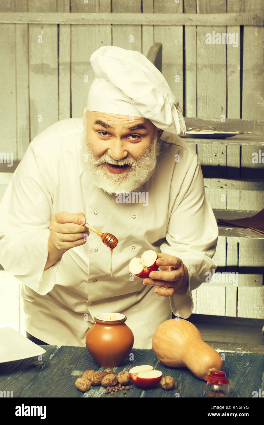 Cook with honey and food Stock Photo - Alamy