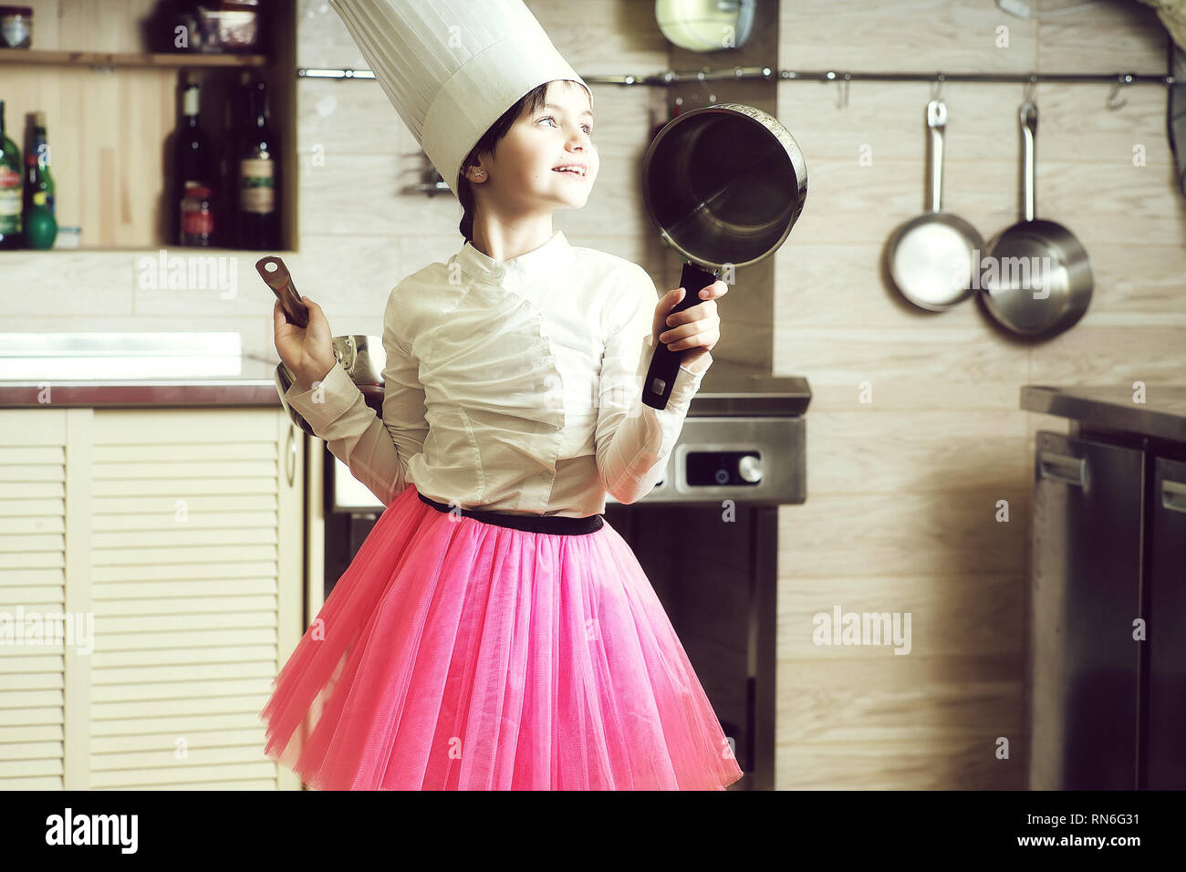 Little girl with pot Stock Photo - Alamy