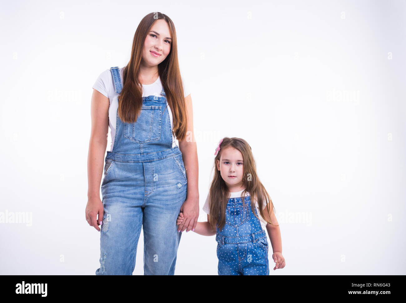 Parenting, family and children concept - Portrait of a mother and her ...