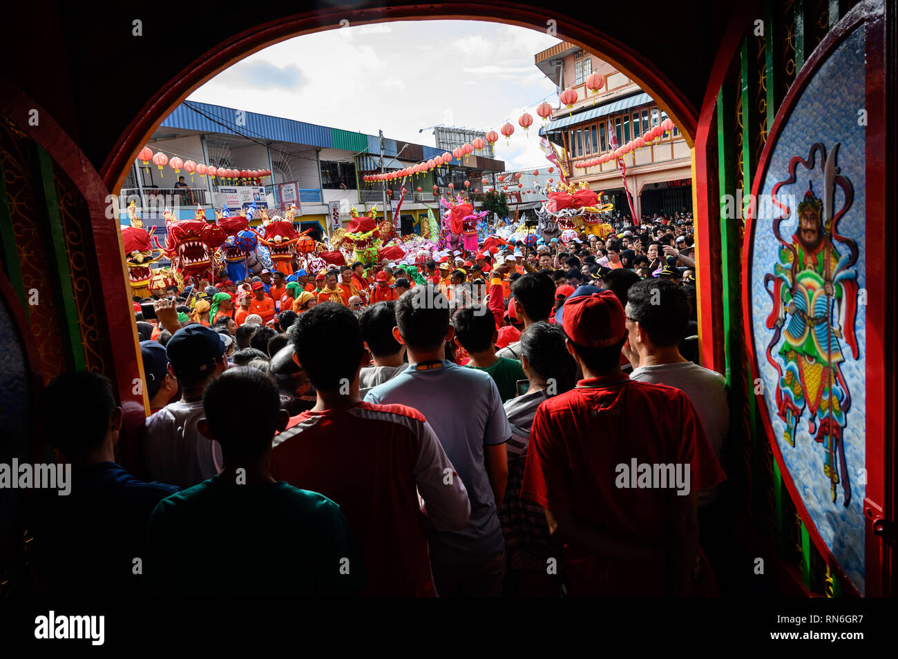 Residents seen watching the performance during the festival. Cap Go Meh ...