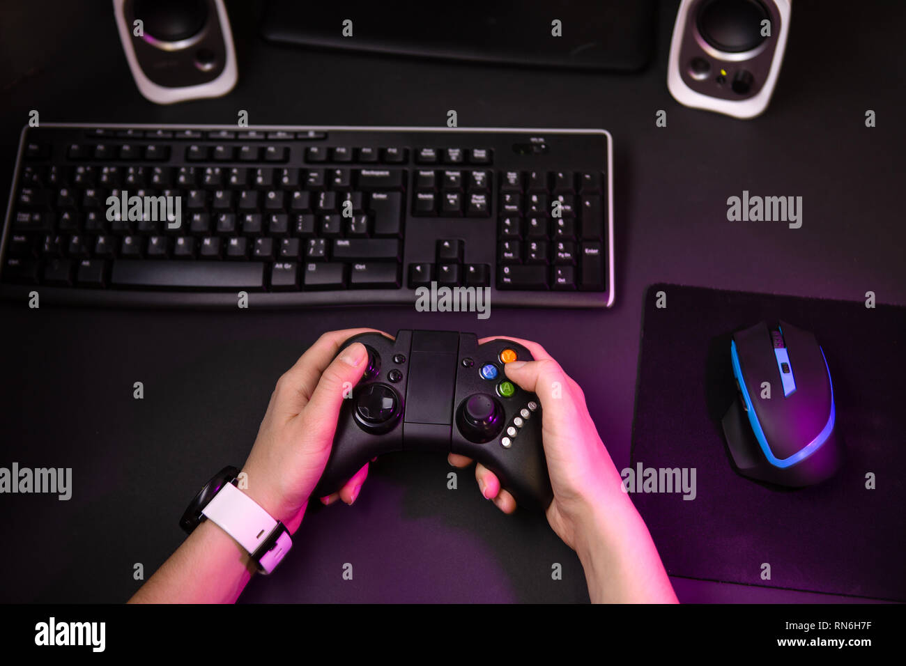 Female hands playing a computer game with a game joystick Stock Photo ...