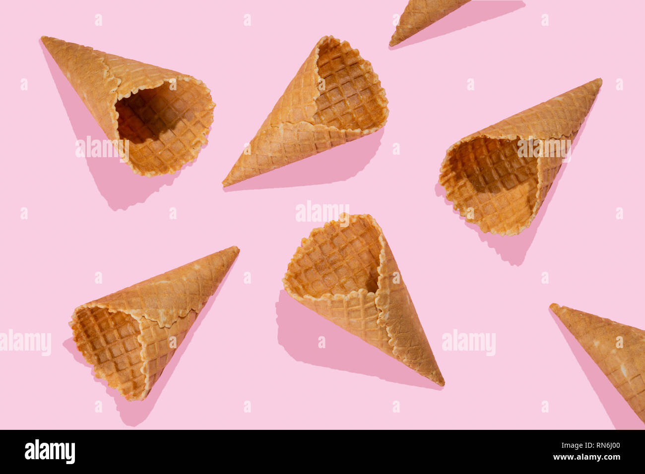 Creative layout - pattern made with ice cream cones Stock Photo - Alamy
