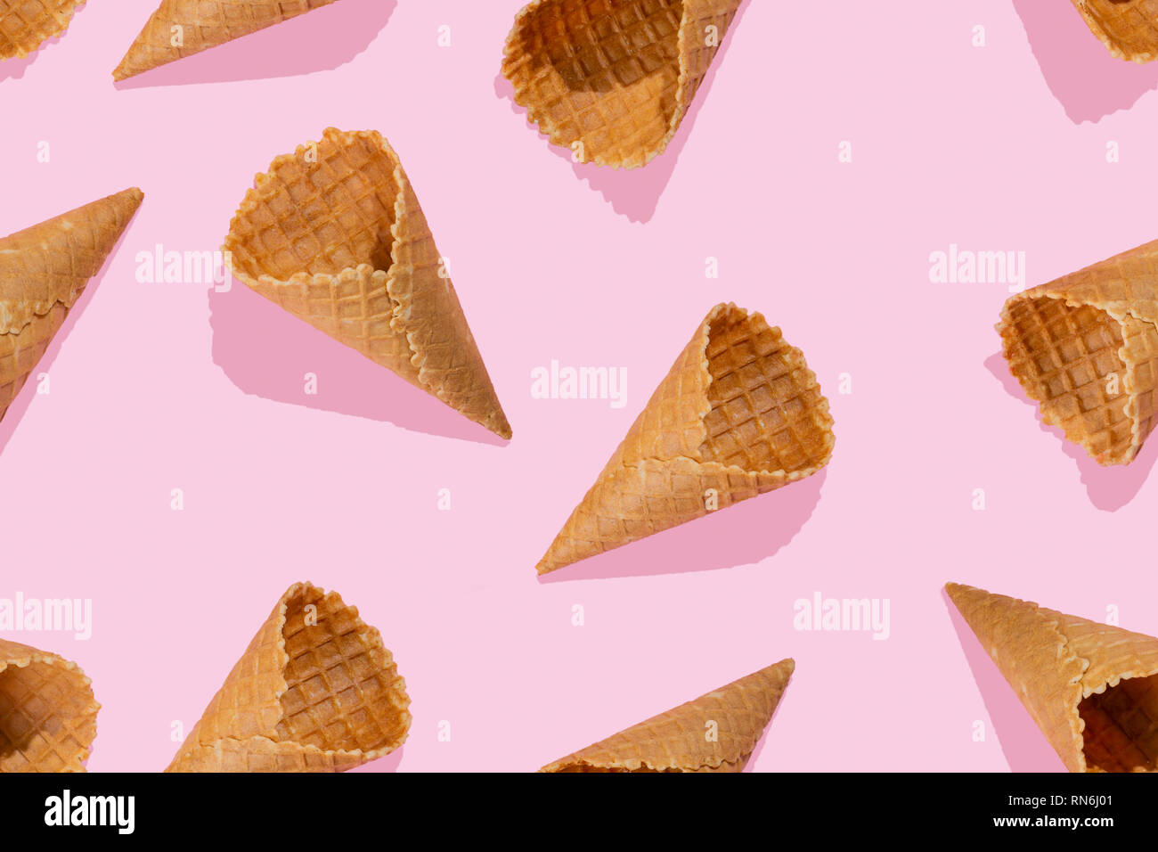 Creative layout - pattern made with ice cream cones Stock Photo - Alamy