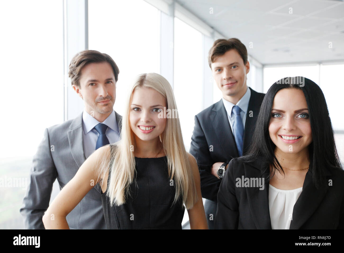 Portrait of happy business team , coworkers in office Stock Photo - Alamy
