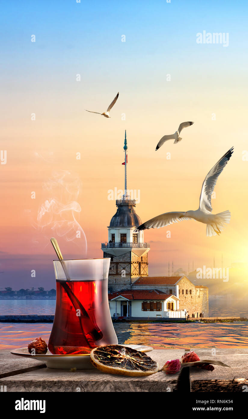 Traditional turkish tea and famous Maiden Tower in Istanbul Stock Photo ...