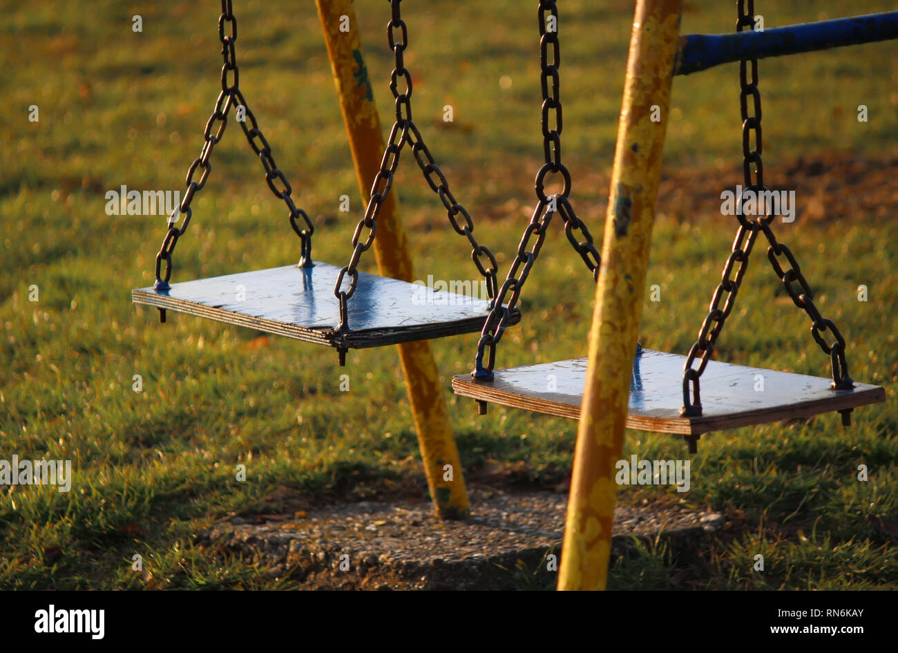 Empty swings hi-res stock photography and images - Alamy