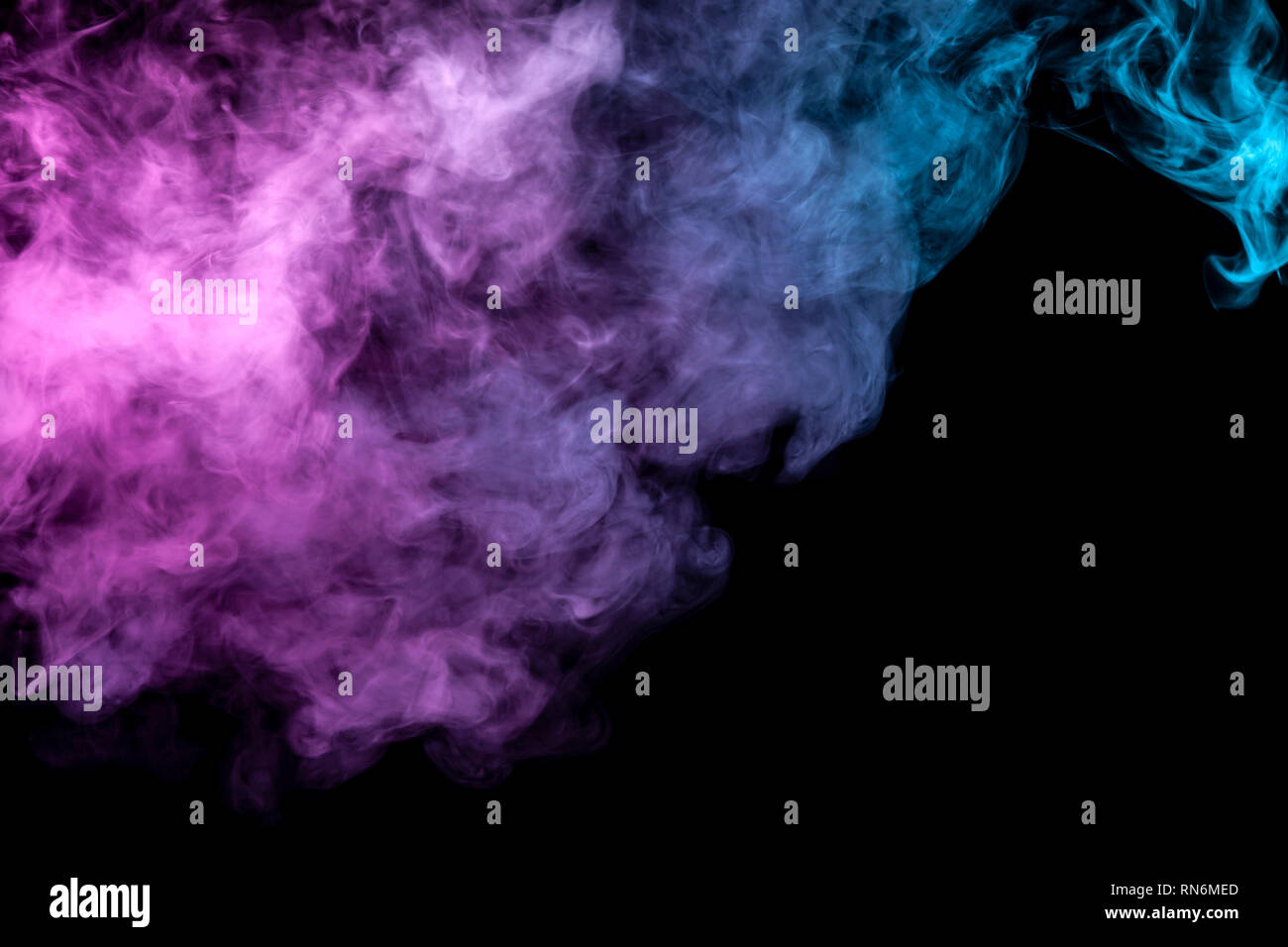 Translucent, thick smoke, illuminated by light against a dark ...