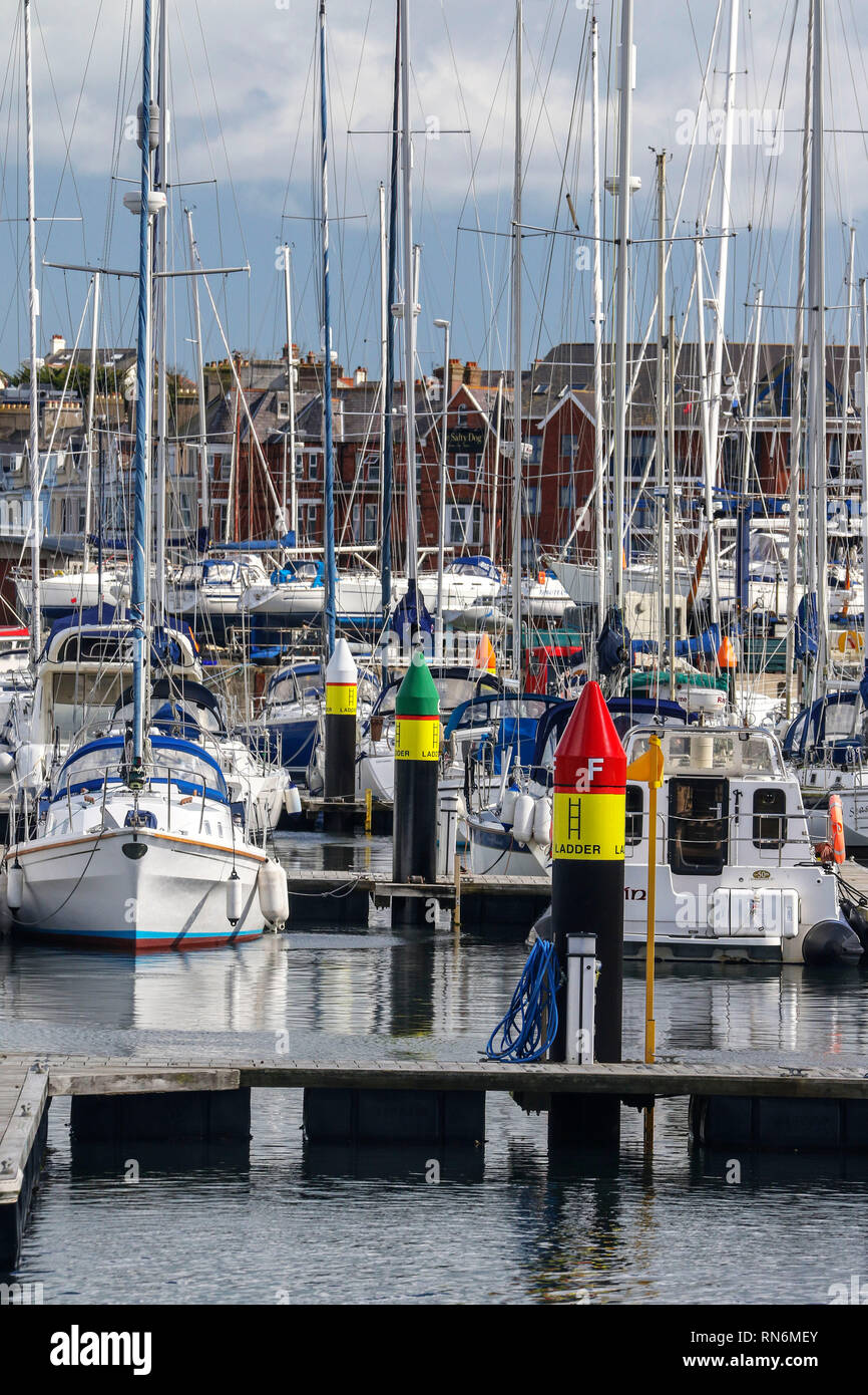 Boats in Belfast harbour in the spring sunshine of Northern Ireland ...