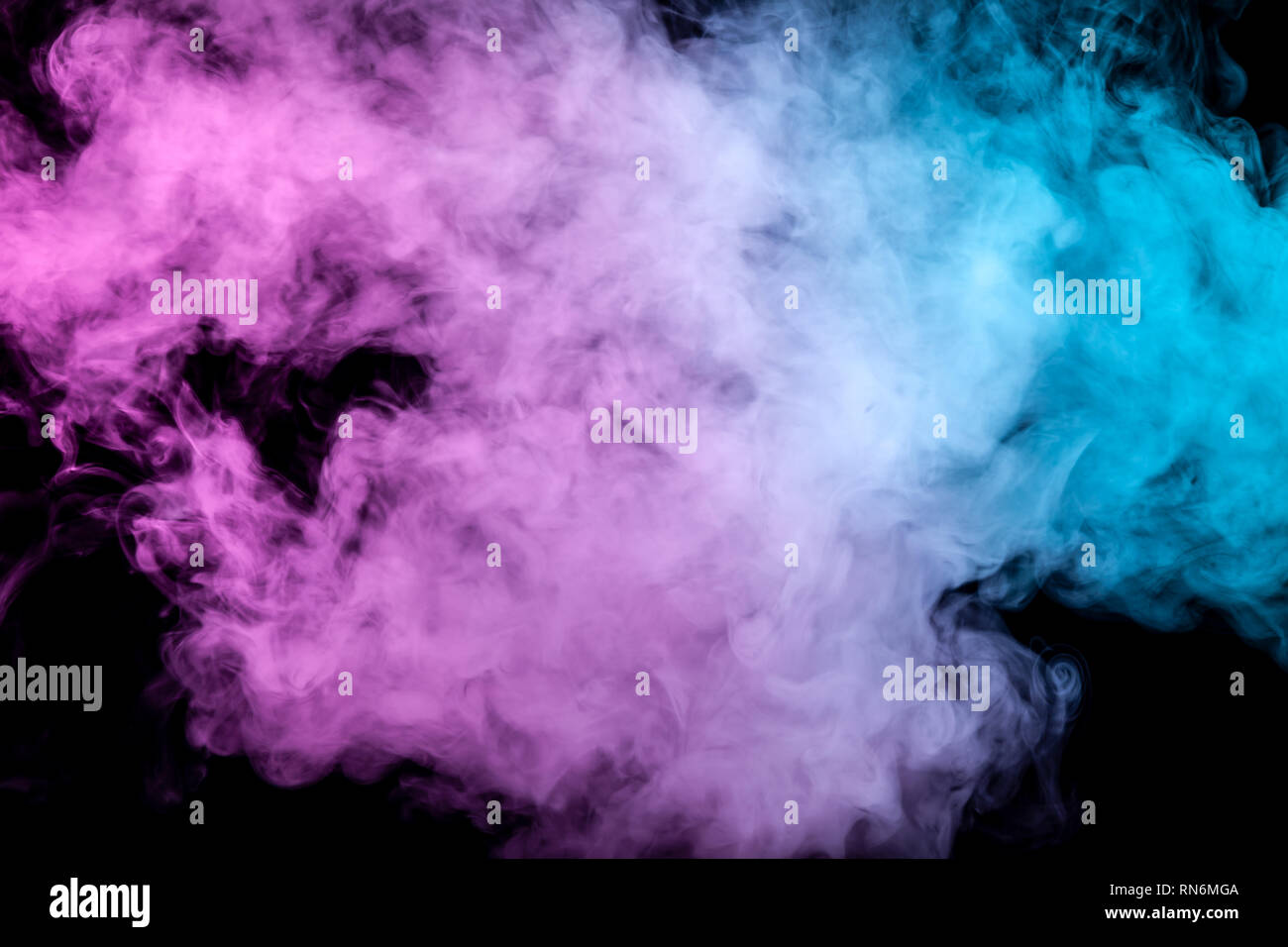 Translucent, thick smoke, illuminated by light against a dark ...