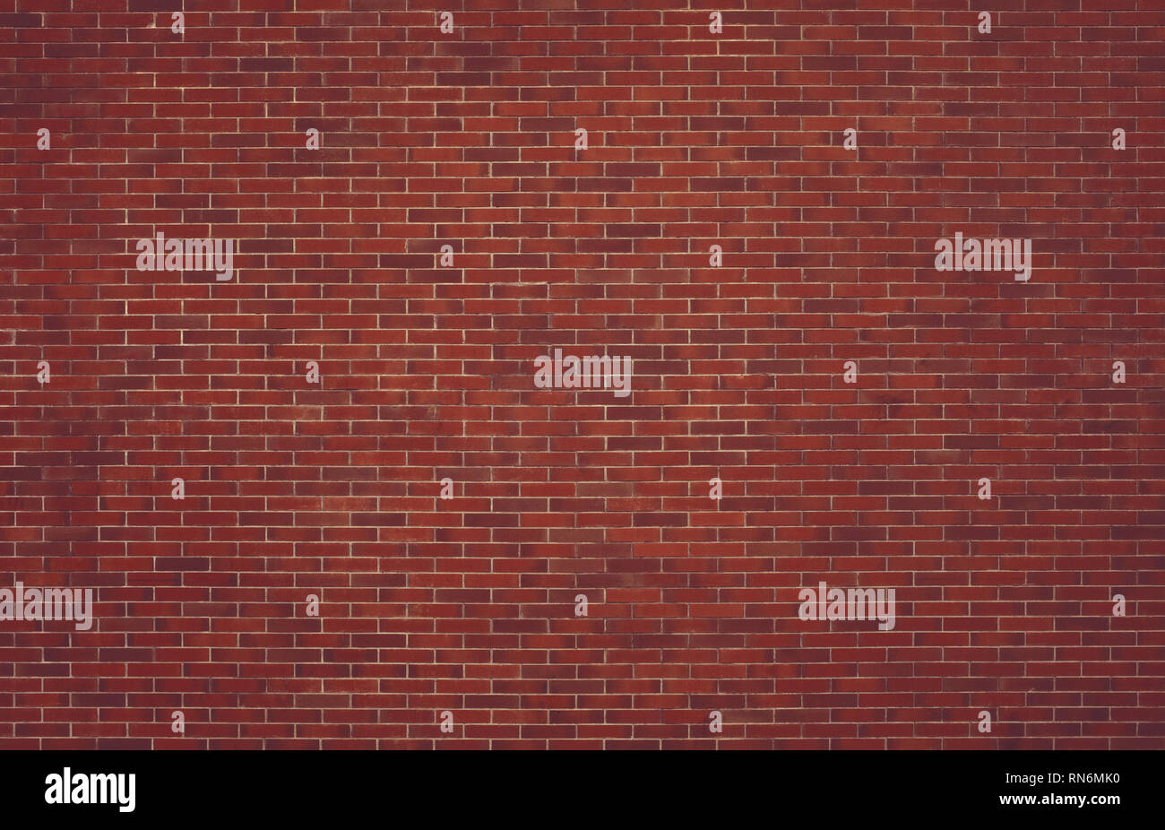 Old brown brick wall texture background Stock Photo - Alamy