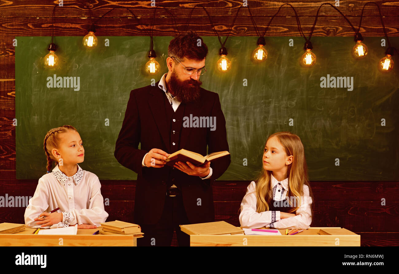 school lesson. school lesson of two small girls. little girls and ...