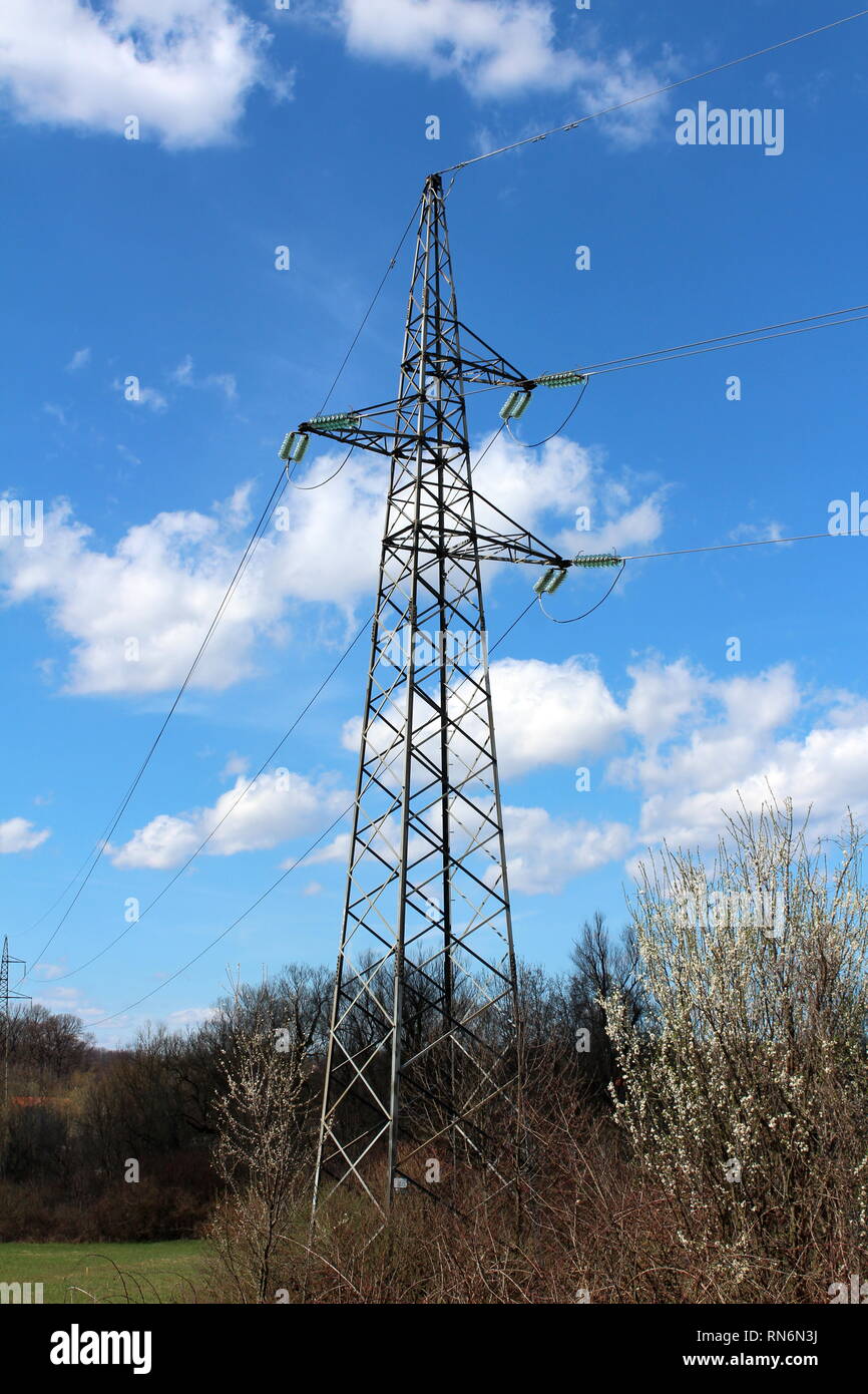 Tall metal electrical power line utility pole made of strong metal ...