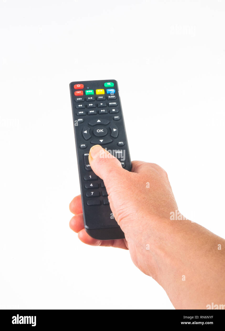 hand holding a remote control on white background Stock Photo - Alamy