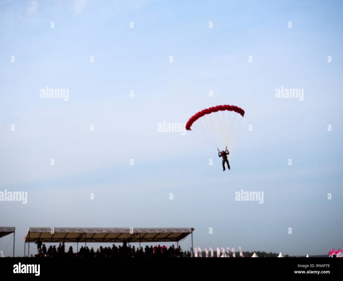 Skydiving. skydiver sky view from the ground Stock Photo - Alamy