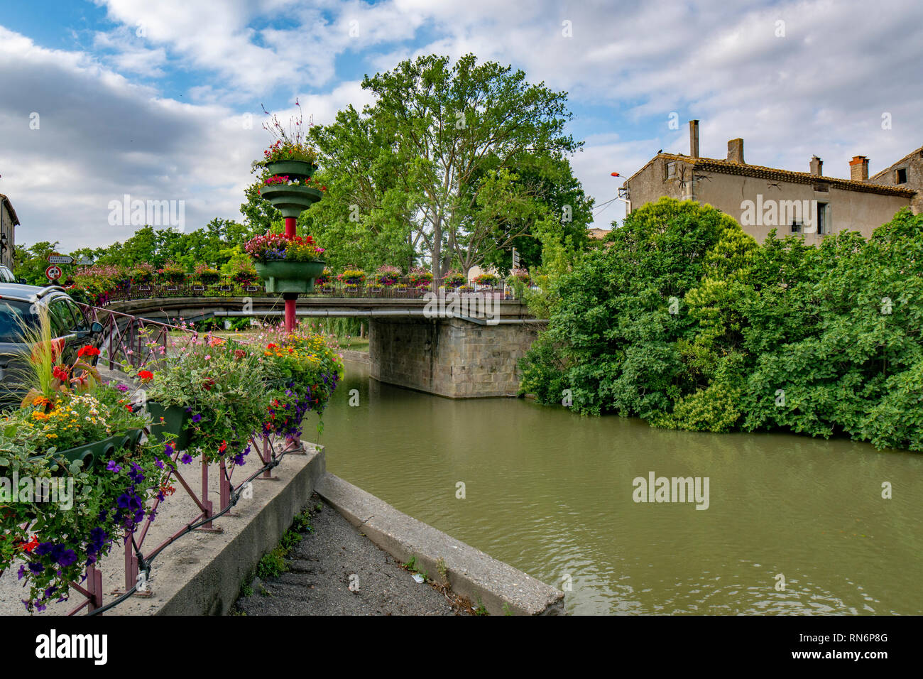 Trebes, France; June 2017: view of the bridge adorned with flowers ...
