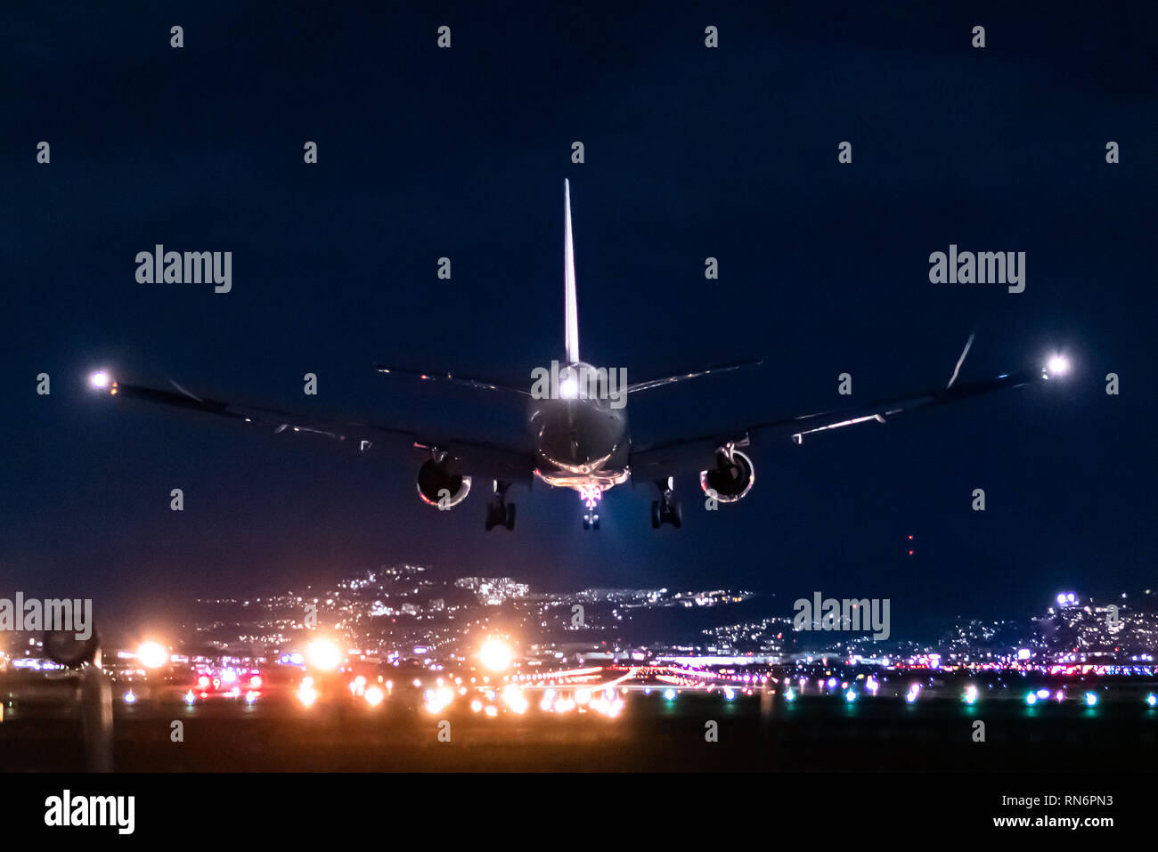 Airplane Taking Off At Night