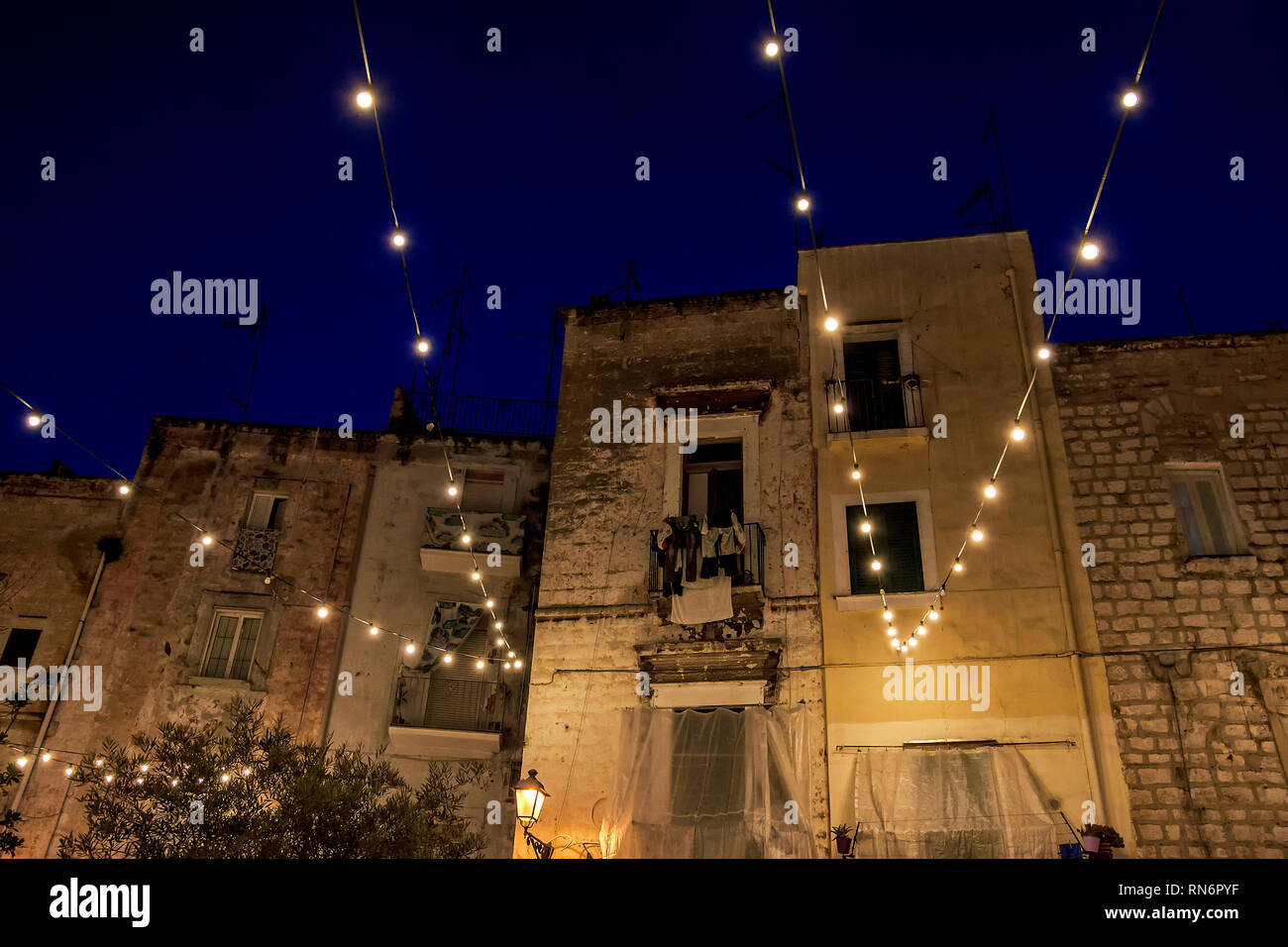 Night view in amazing Old Town , historical center of Bari , Italy ...