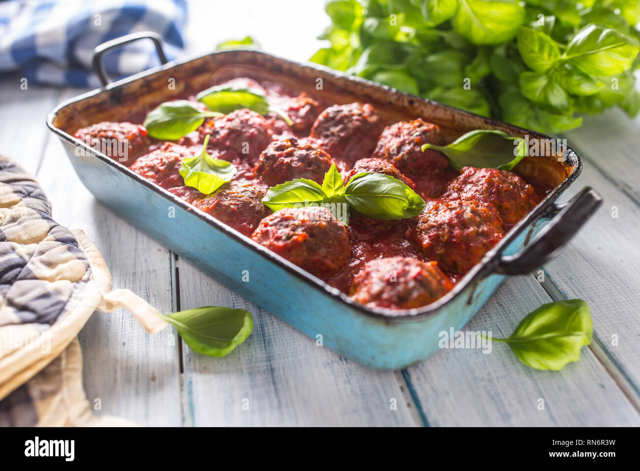 Delisious italian meal meat beef balls with basil in vintage roaster ...