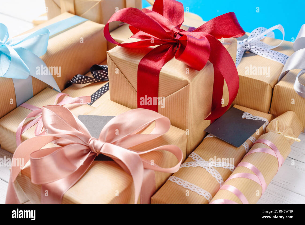 gift boxes with ribbon and bows on white background, top view Stock ...