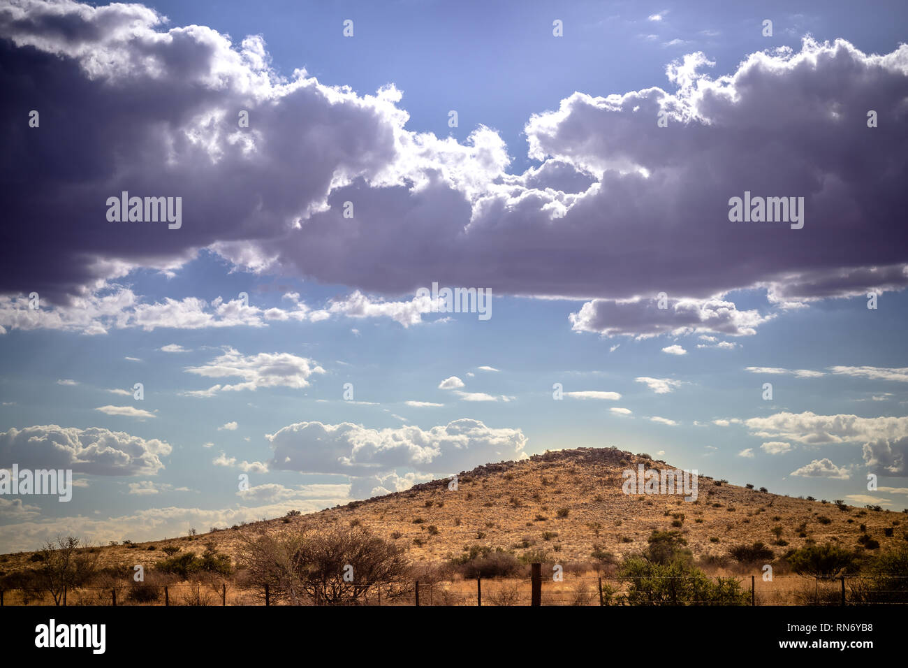 Desert landscape with promising storm clouds Stock Photo - Alamy