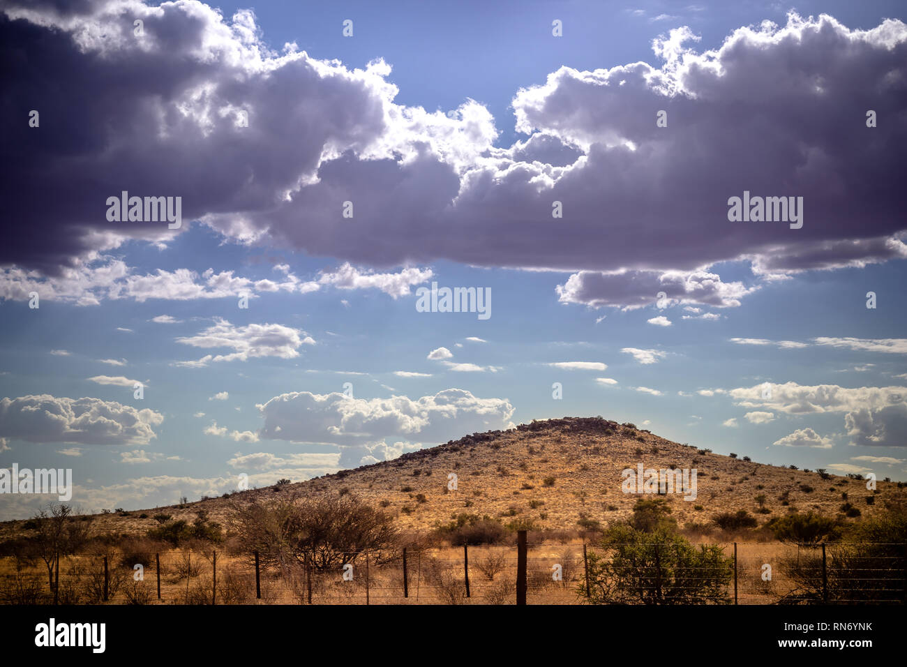 Desert landscape with promising storm clouds Stock Photo - Alamy